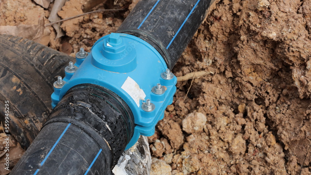 Split pipe clamp. Tapping sadder clamp is a plastic plumbing clamp with ...