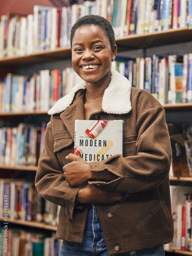 Black woman student, portrait and library with book, research or ...