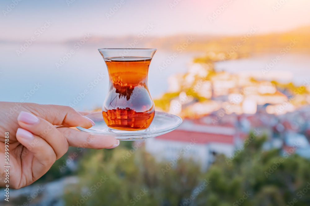 Delicious and fragrant Turkish tea in a traditional authentic bardak ...