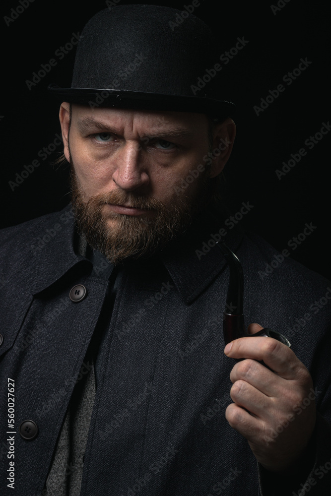 stylish man in retro outfit suit hat smoking wooden pipe sherlock holmes look cosplay england ...