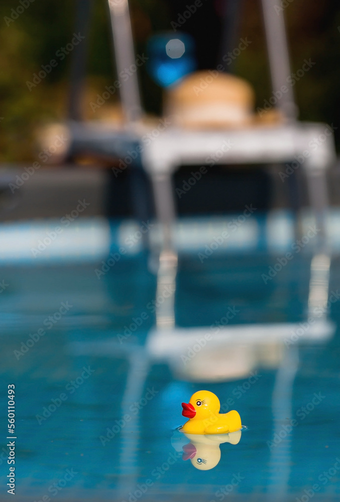 Summer season, the concept of a children's game. A small rubber yellow ...