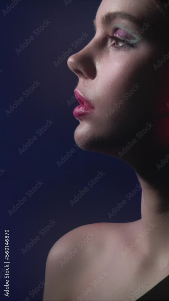 Vertical video. Retro fashion. 90s model. 2000s beauty look. Profile of ...