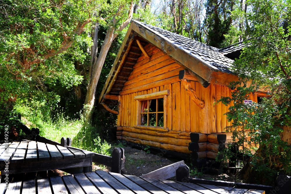 Wooden log house located in the Bosque de Arrayanes. Victoria Island ...