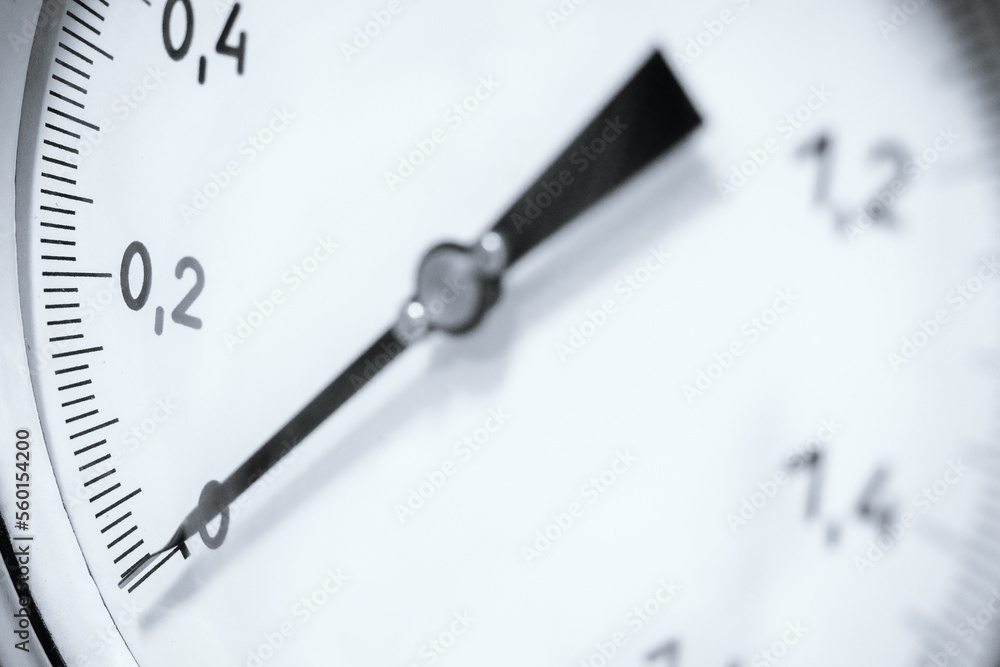 Pressure gauge close-up. Arrow of pressure gauge shows zero on scale ...