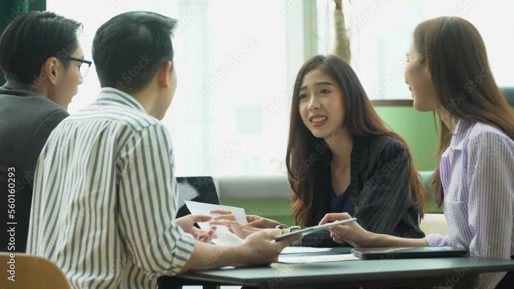 group of happy asian young university students brainstorming and ...