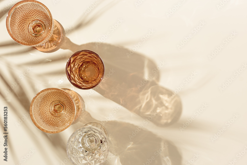 Beautiful top view glasses from transparent and beige colored glass ...