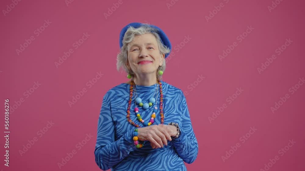 Funny grandmother old woman posing on colored background. Grandma ...