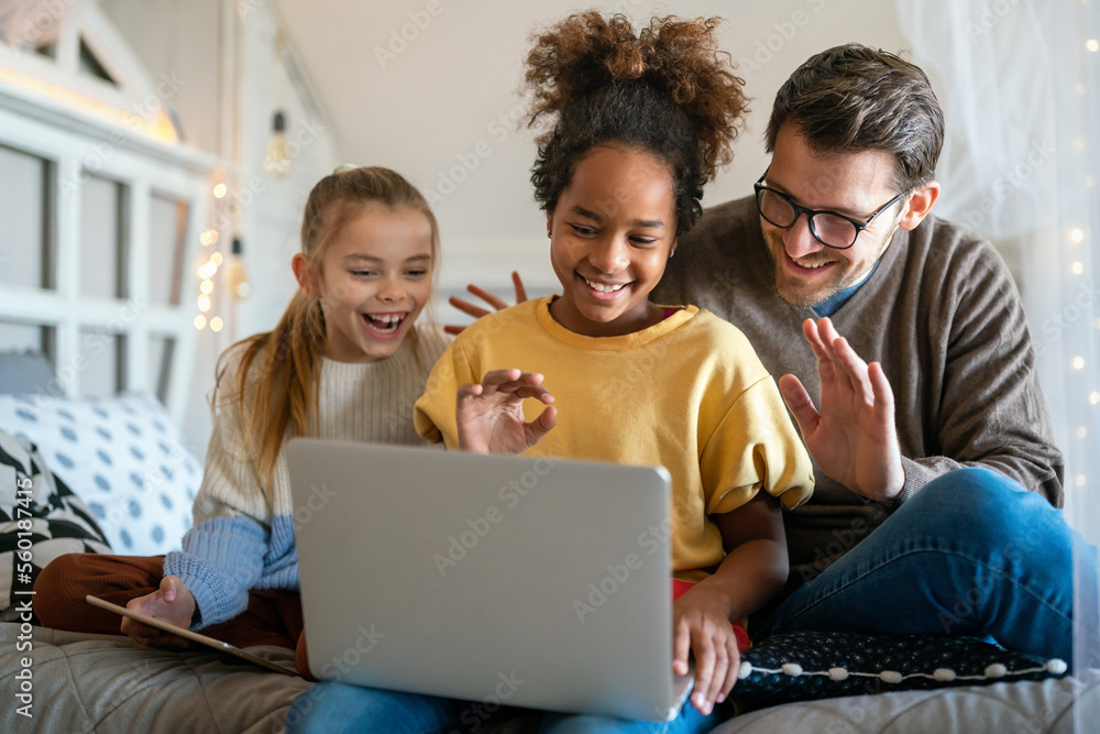 People, family and technology concept. Happy father with multiethnic ...