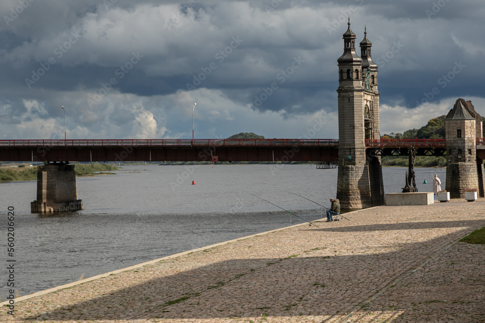 Medieval stone bridge over a river in northern Europe. This is the ...
