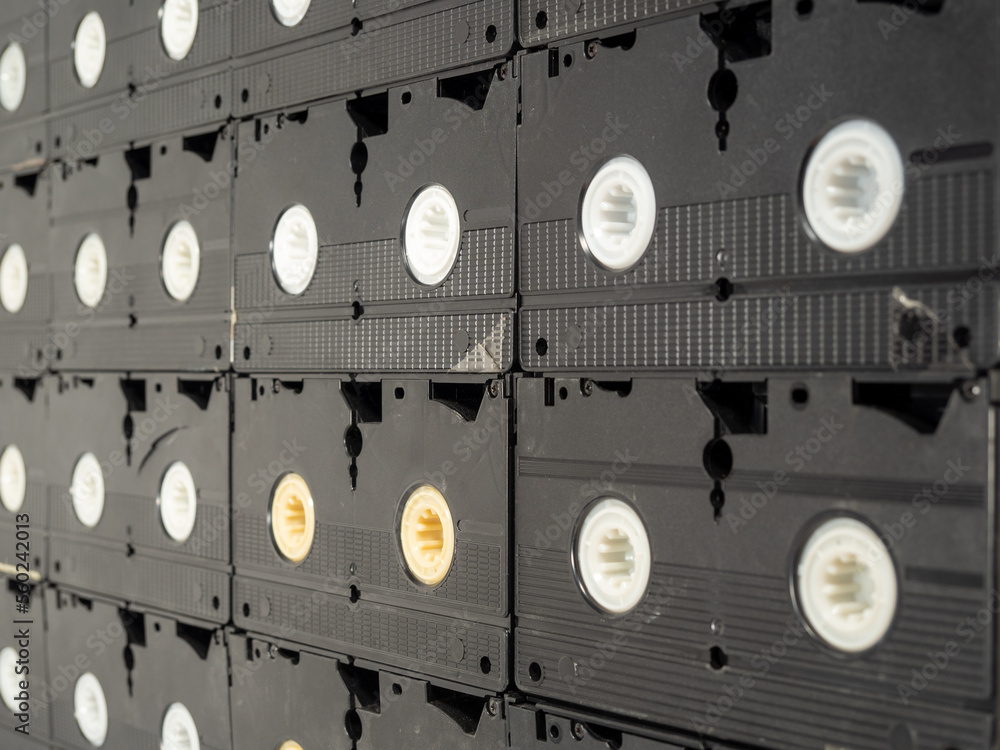 Background from old VHS cassettes. Retro video cassettes. Stock Photo ...