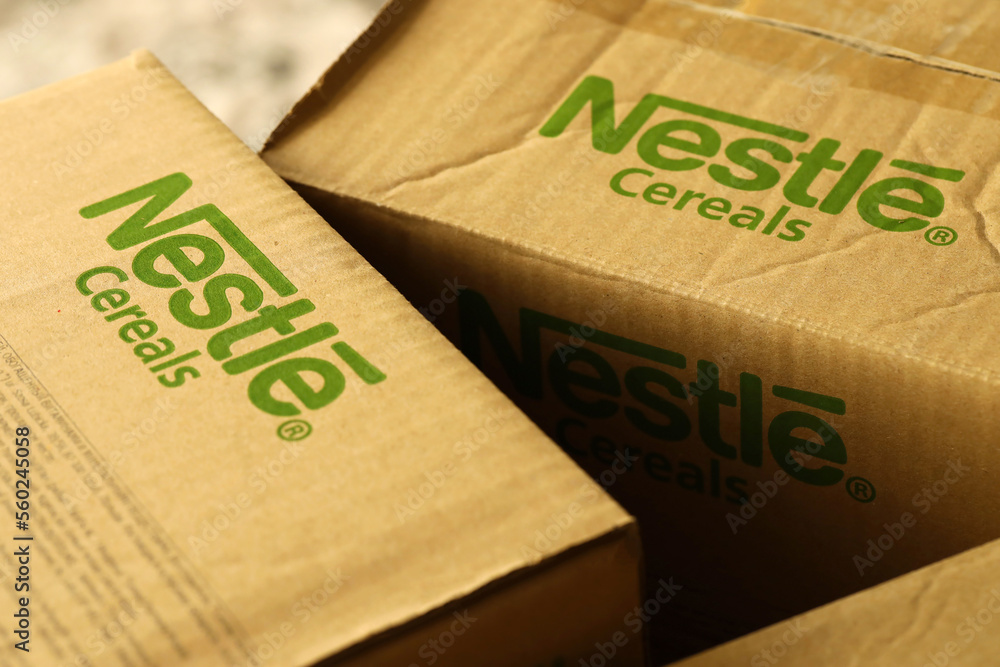 KYIV, UKRAINE - MAY 4, 2022 Big cardboard boxes with logo of Nestle ...