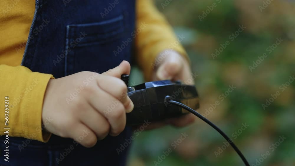 Portable control station of construction crane toy. Kid boy builder ...