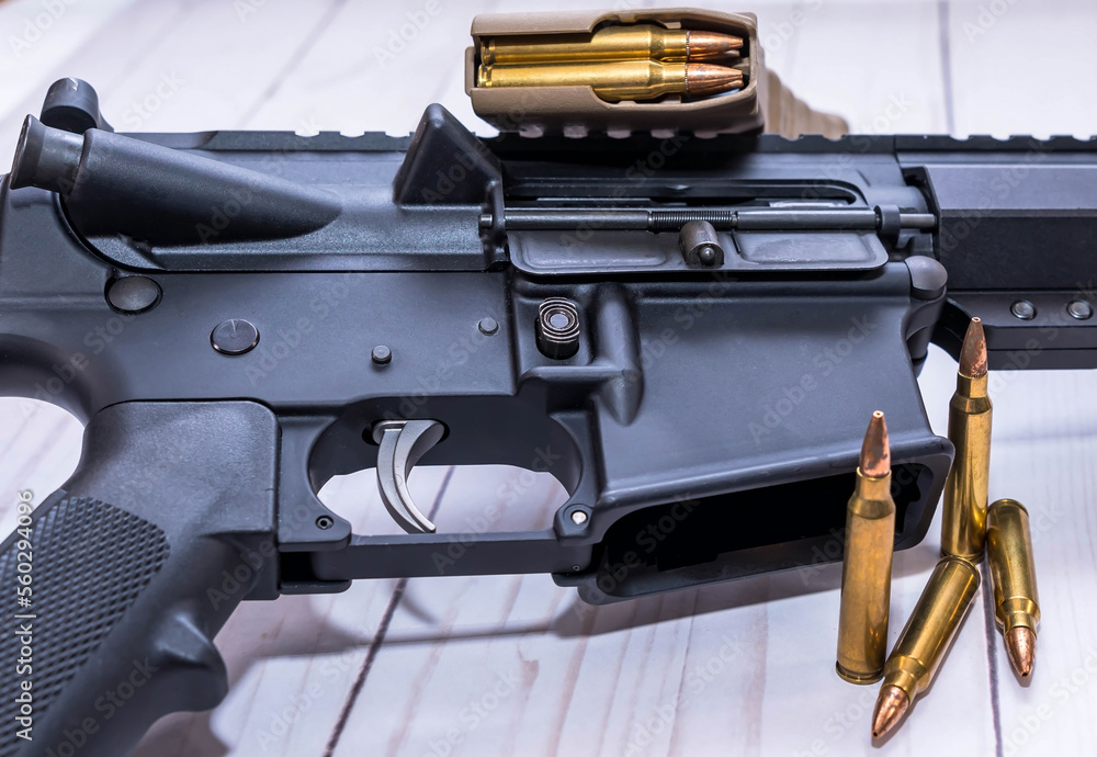 An AR15 rifle chambered in 223 caliber with four bullets and a loaded ...