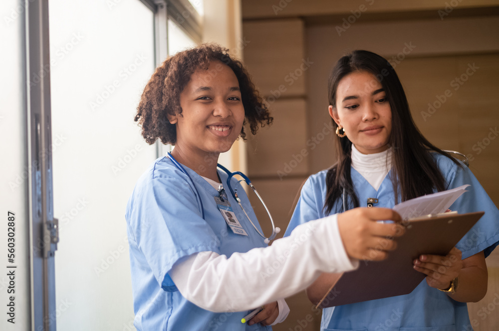 Nurse student Multi-ethnic group of happy nursing students talking ...