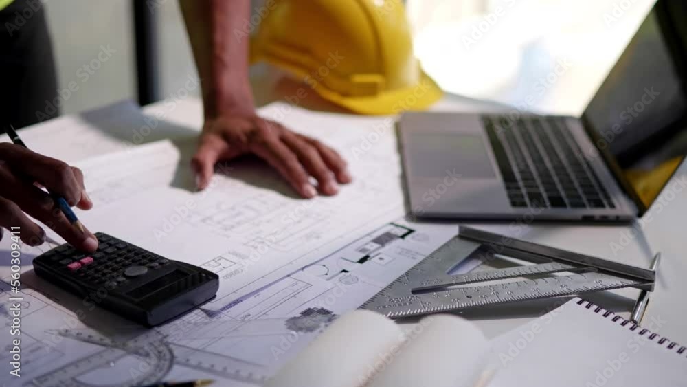 Close up of hands working and calculations estimate for cost and ...