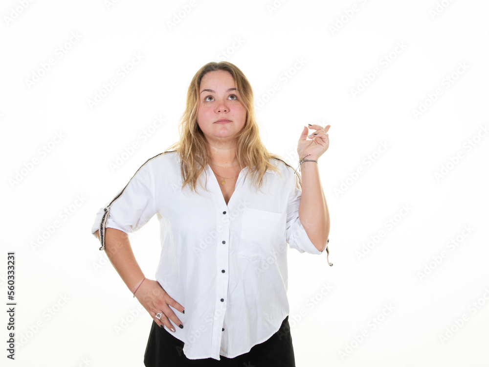 Blond chubby Business woman looking up Pointing Finger on side Empty ...