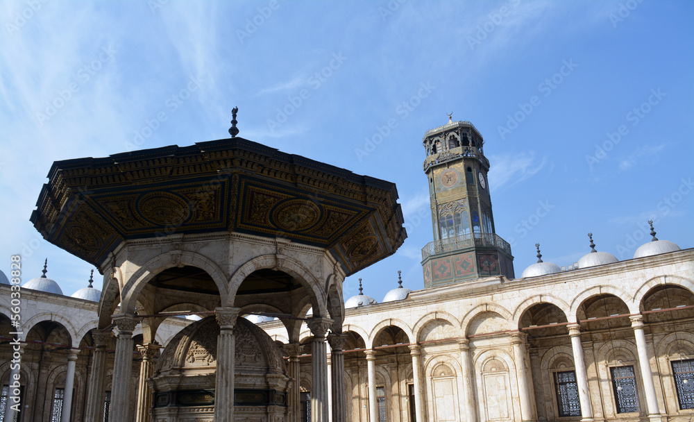 Ablution fountain and the clock tower in courtyard of The great mosque ...