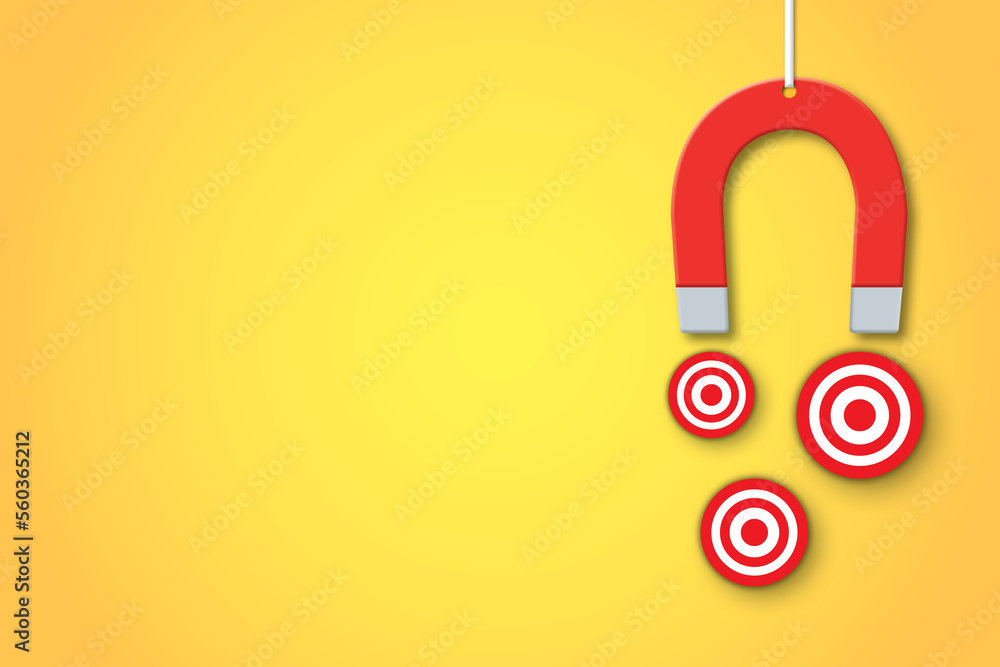 Magnet attracting target on yellow background as metaphor for business ...