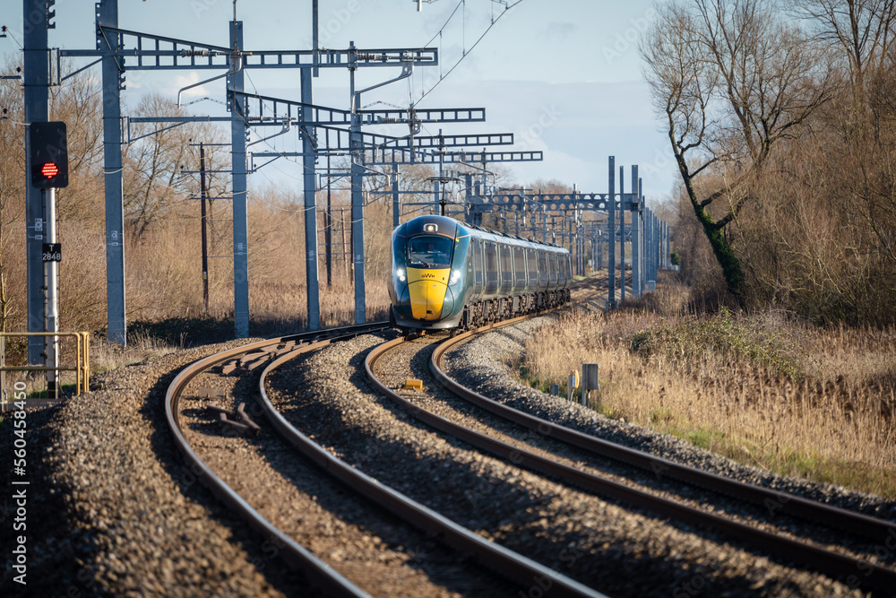 Fast intercity electric GWR train travelling to London Paddington ...