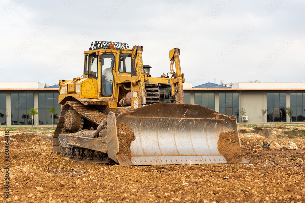 Dozer working at construction site. Bulldozer for land clearing ...
