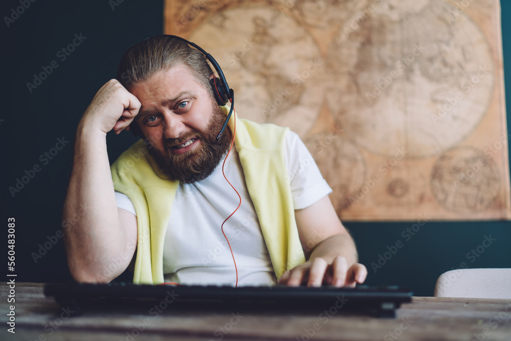 Nervous male gamer playing videogame Stock Photo | Adobe Stock