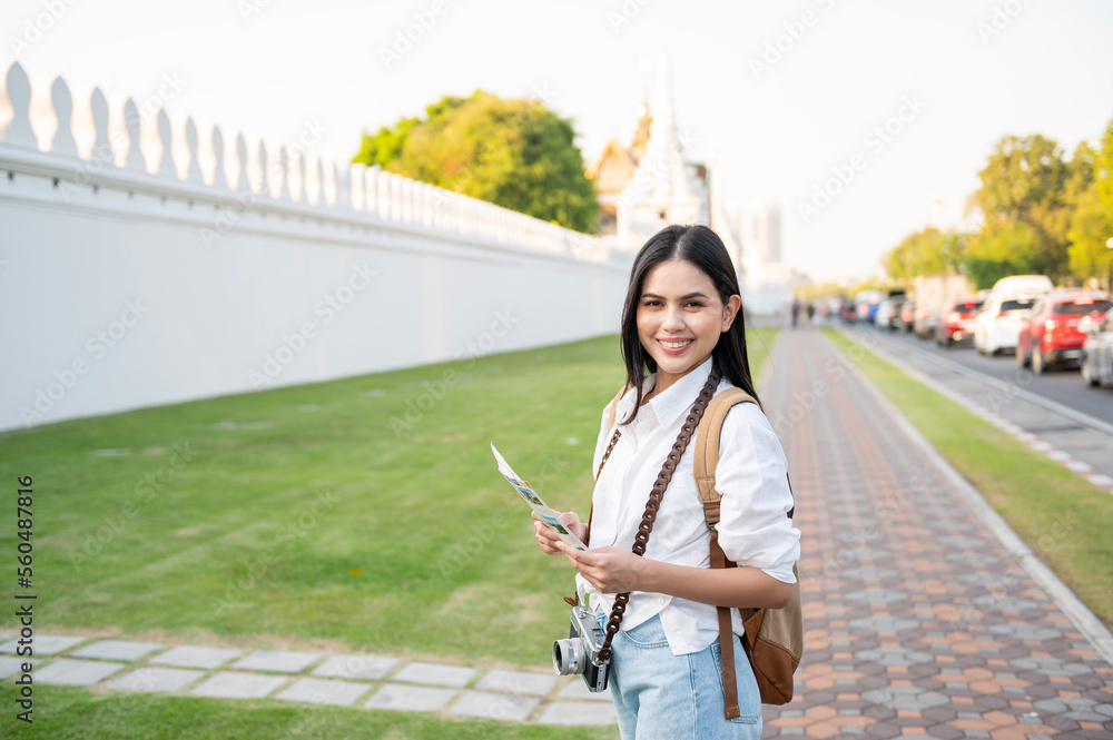 Beautiful tourist woman on vacation sightseeing and exploring Bangkok ...