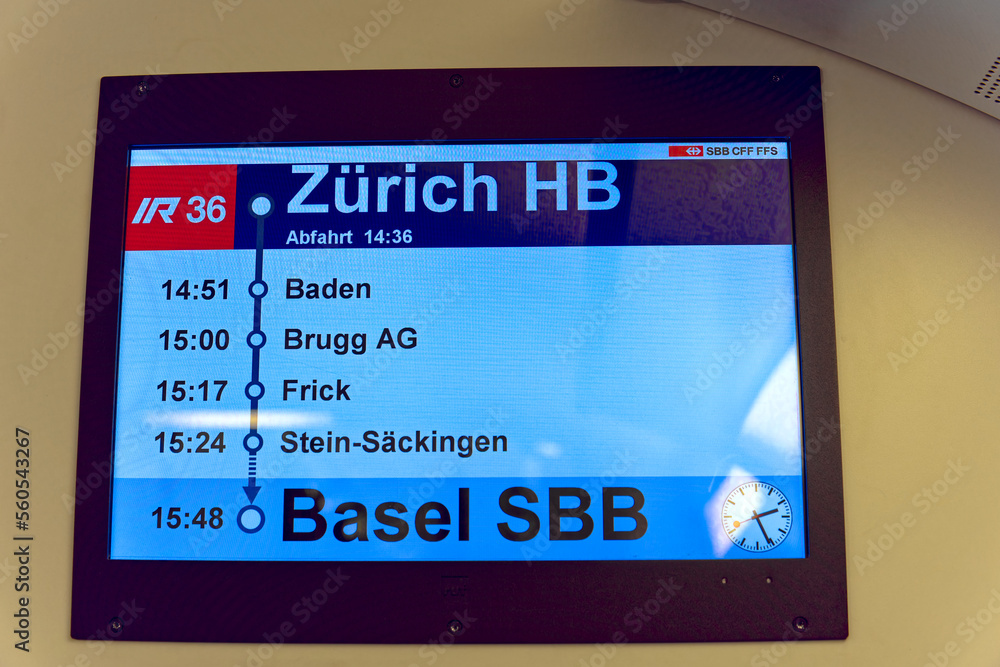 Departure board screen inside SBB train at Zürich main railway station HB destination Basel SBB ...
