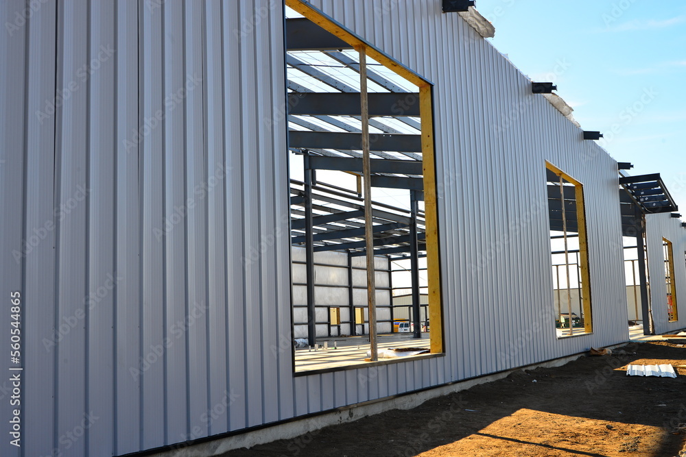 Exterior of steel frame commercial building under construction. Stock ...
