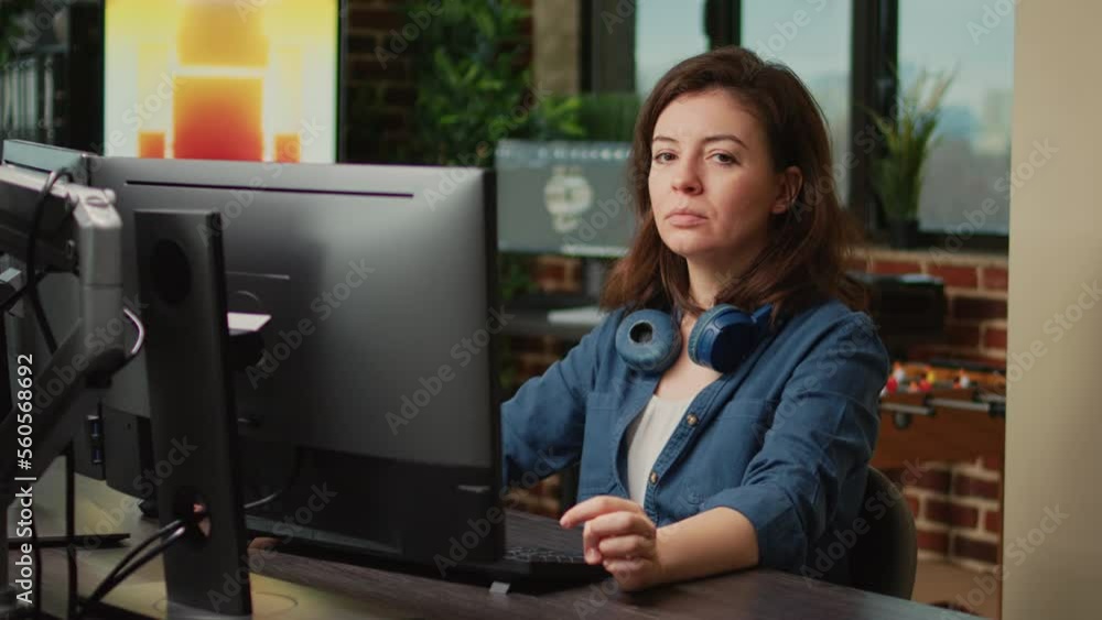 Woman content creator working with 3d render software, analyzing ...