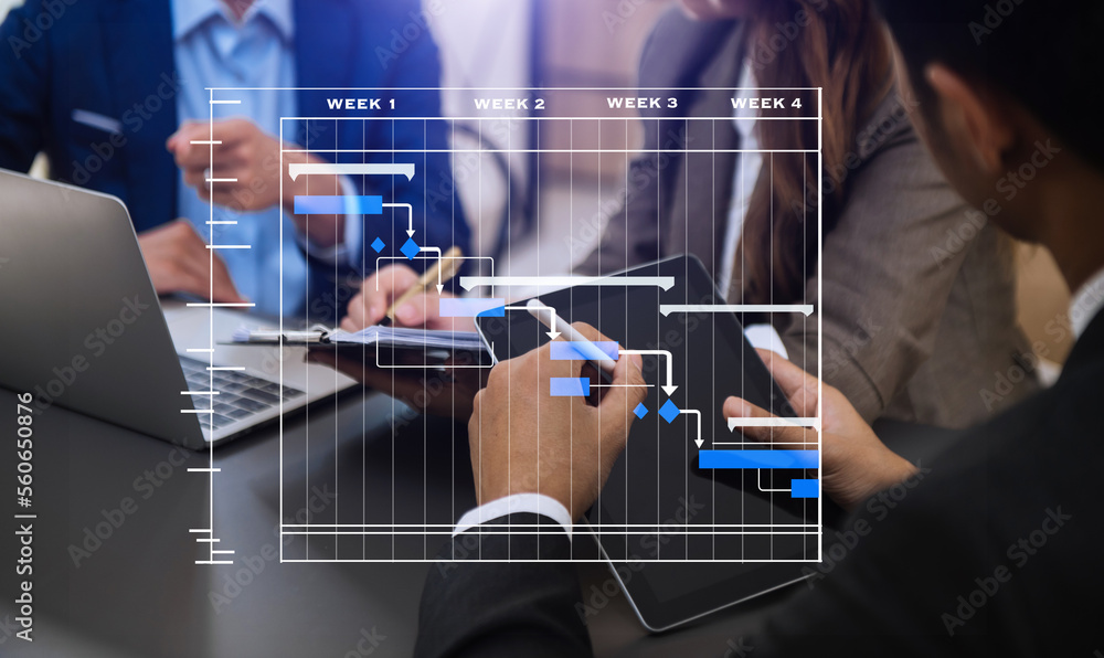 Fototapeta: Project manager working and update tasks with milestones ... Fototapeta: Project manager working and update tasks with milestones ...