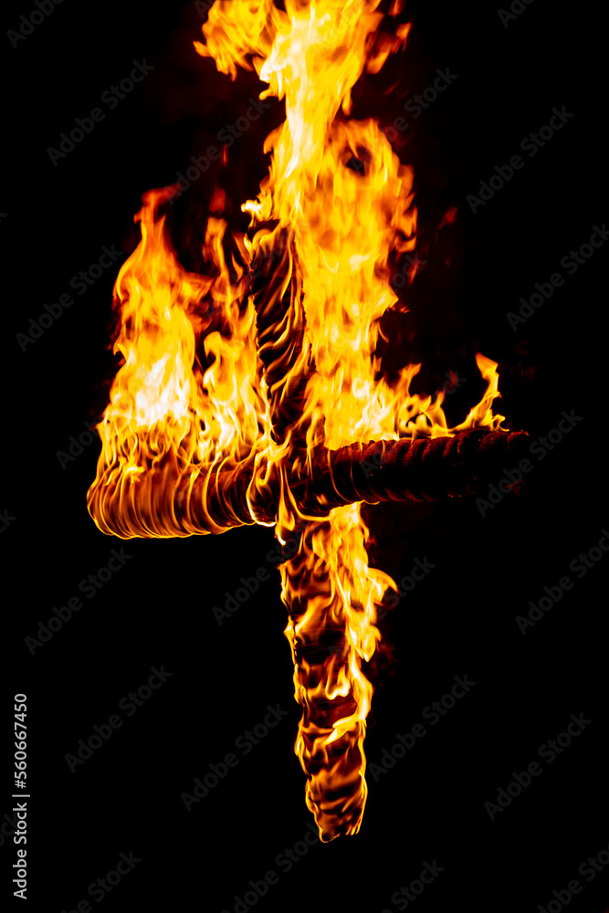 A burning cross, representing one of the 17 Protestant martyrs who were ...