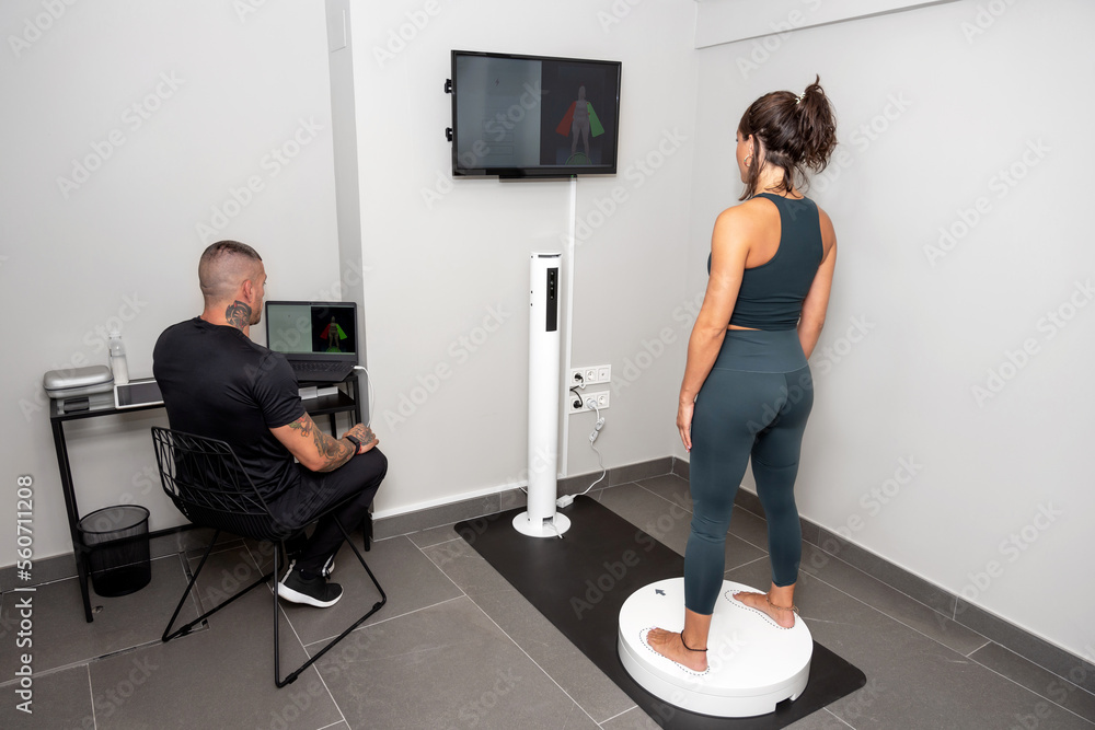 Athletes reading 3D body scanner data Stock Photo | Adobe Stock