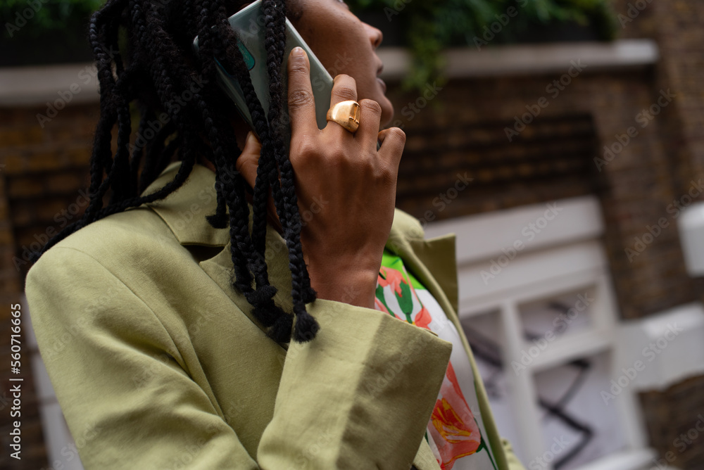 Black woman on phone call Stock Photo | Adobe Stock