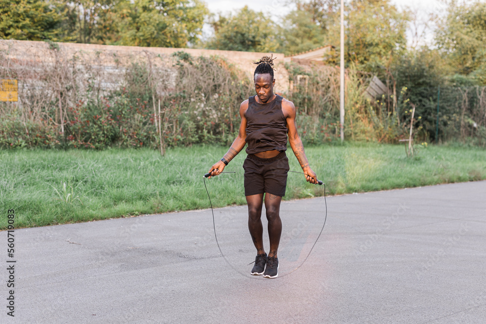 Man Jumping Rope Stock Photo | Adobe Stock