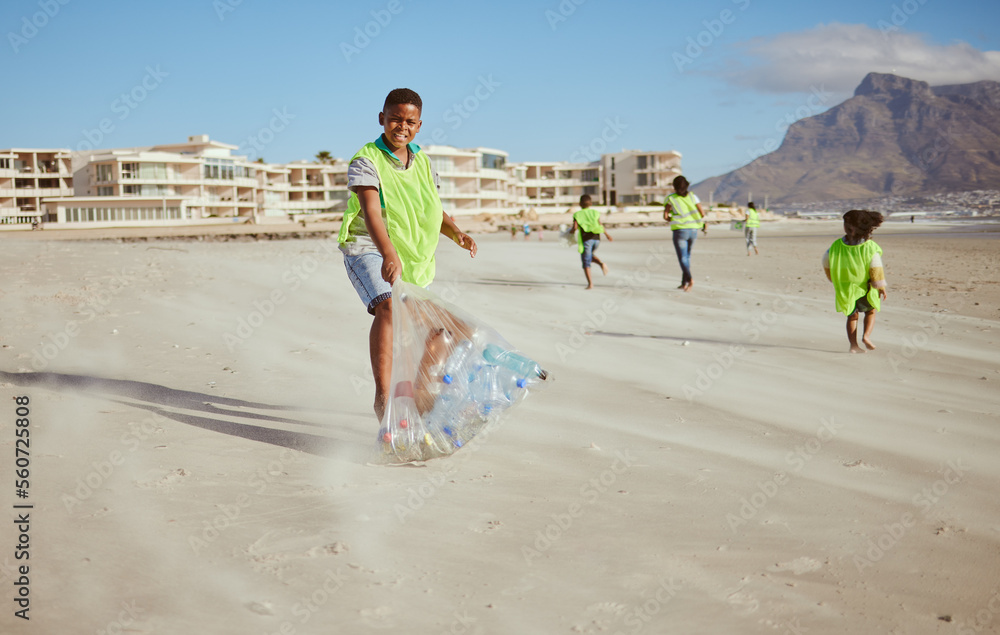 Foto de Boy, portrait and trash collection bag in beach waste ...