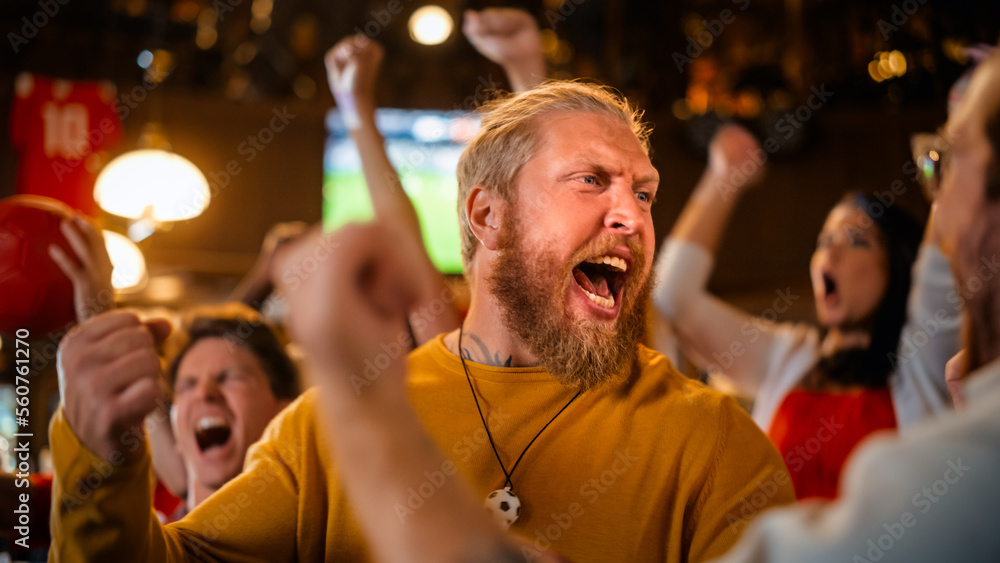 Excited Soccer Club Members Cheering for Their Team in a Pub ...