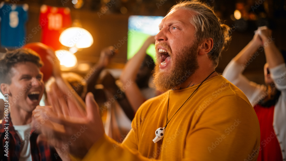 Excited Soccer Club Members Cheering for Their Team in a Pub ...