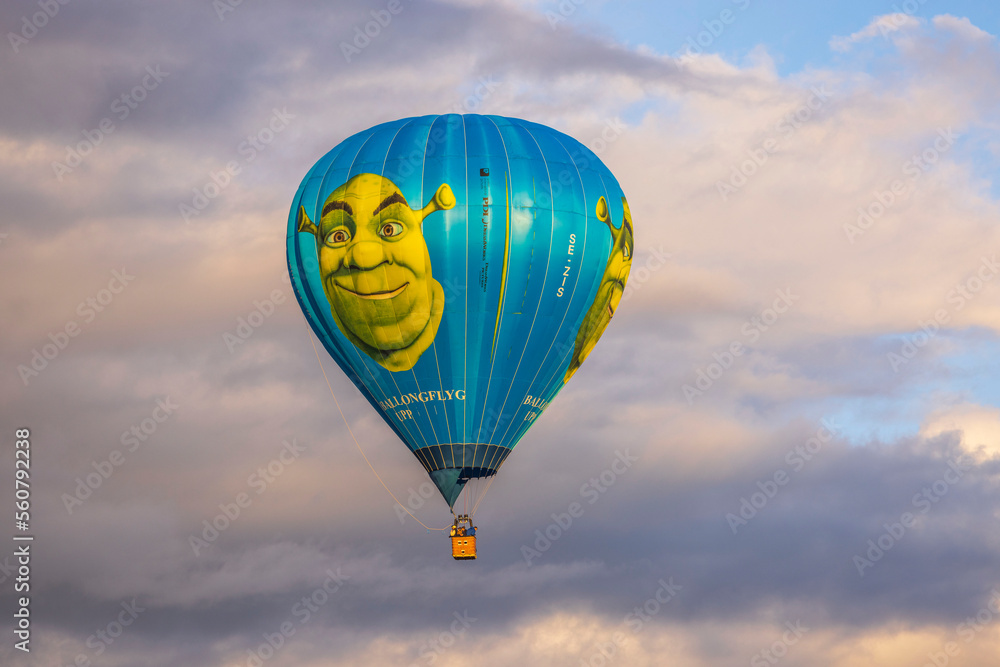 Shrek hot air balloon in cloudy blue sky with white clouds. Sweden ...