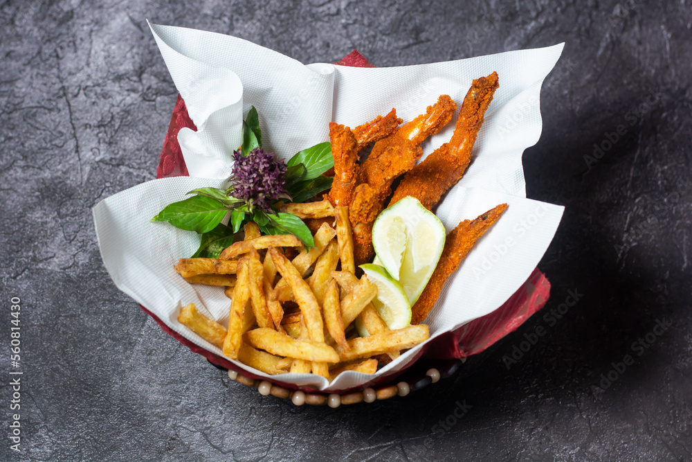 Special Fried Prawn with french fries served in dish isolated on grey ...