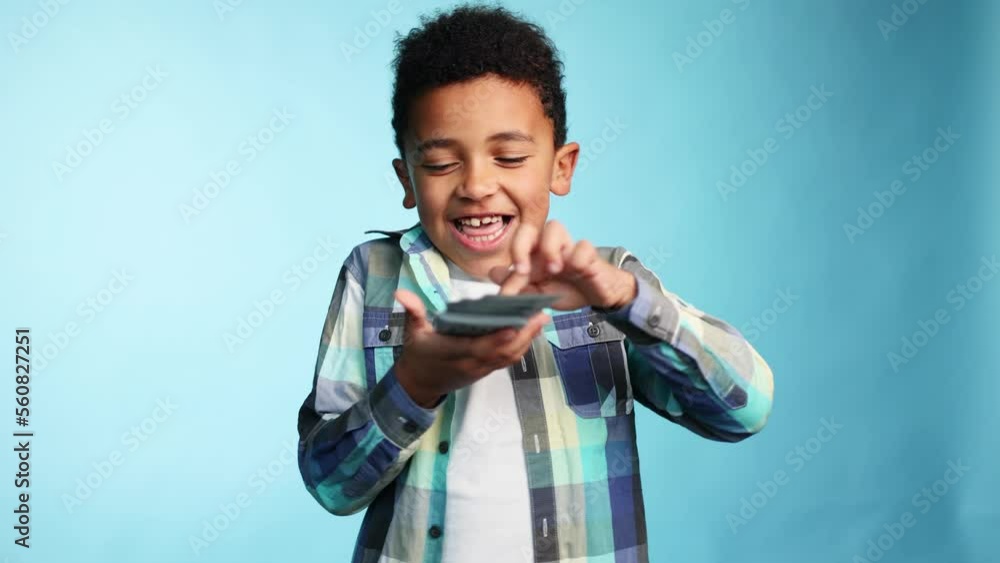 Cute little african american rich boy scatter banknotes dollars on ...