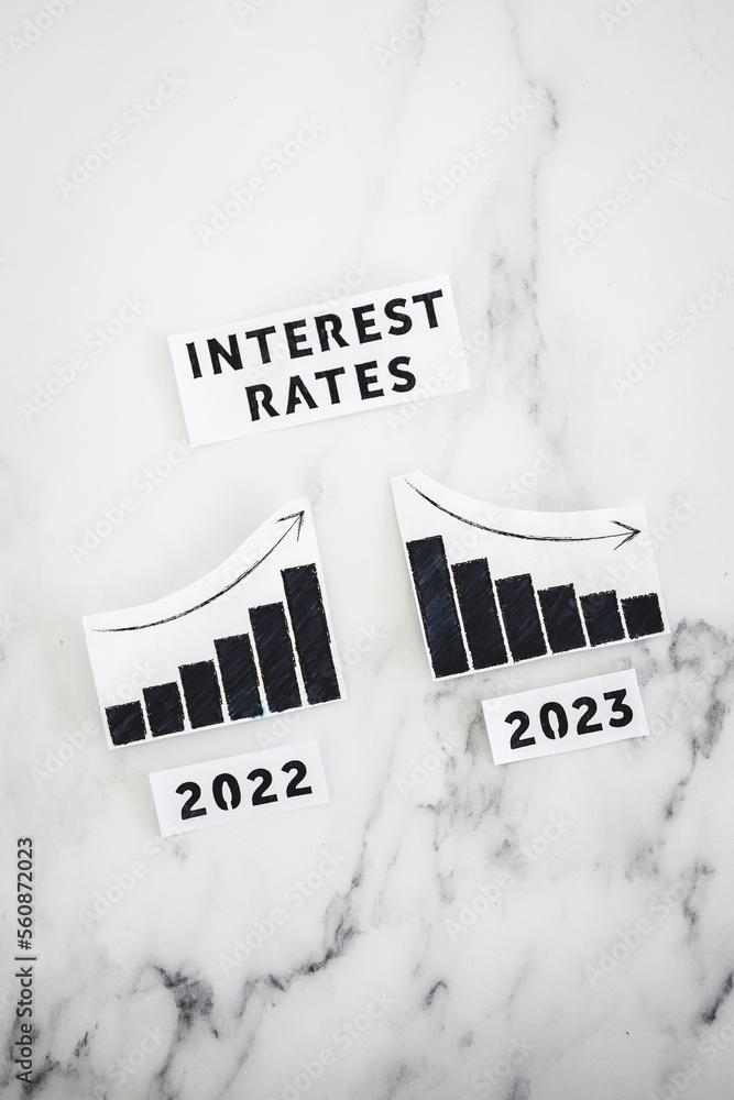 interest rates text with 2022 chart showing stats increasing and 2023 ...