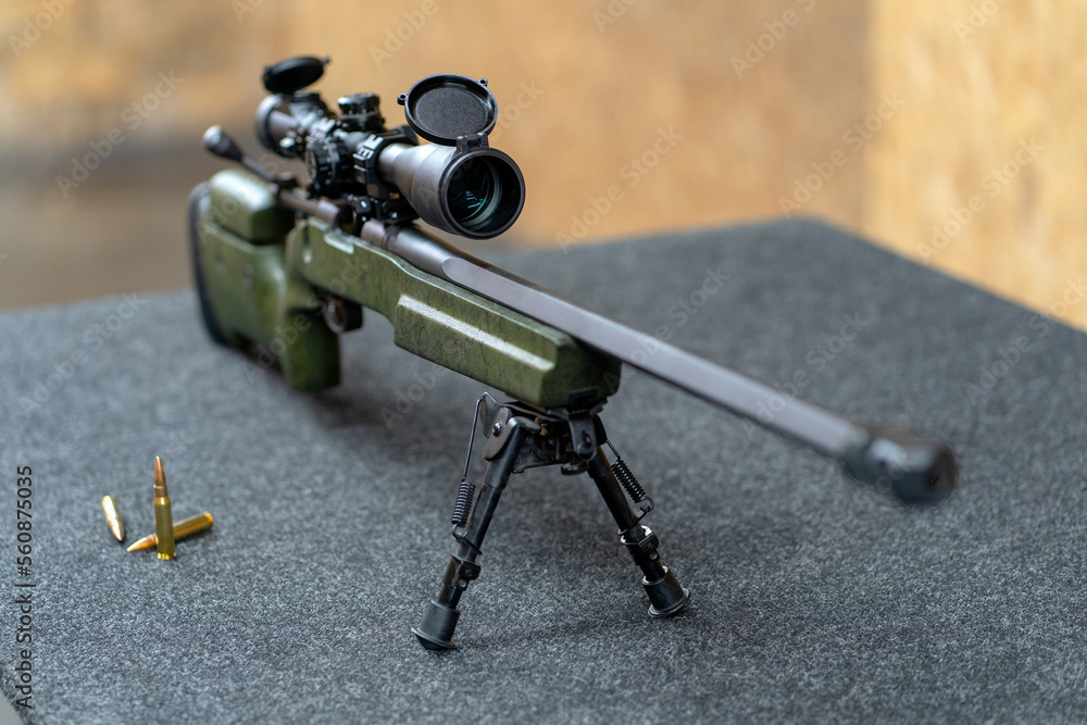 Sniper rifle with optical sight close up. Stock Photo | Adobe Stock