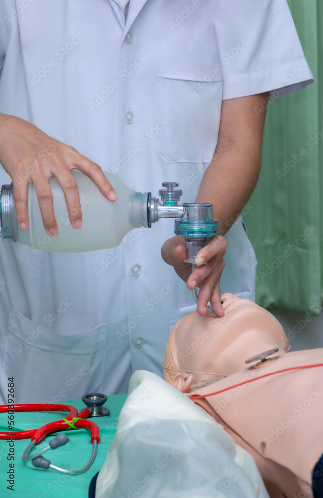 Doctor holding breathing bag(Ambu bag).Demonstrating CPR (Cardiopulmonary resuscitation ...