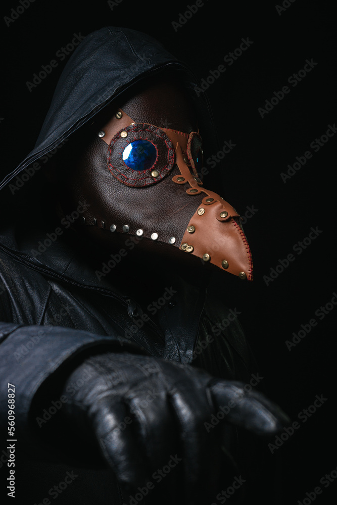 Plague doctor with crow-like mask isolated on black background Creepy ...
