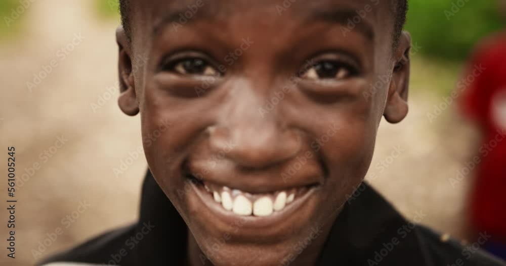 Close Up Portrait of a Playful Authentic African Kid Looking at the ...