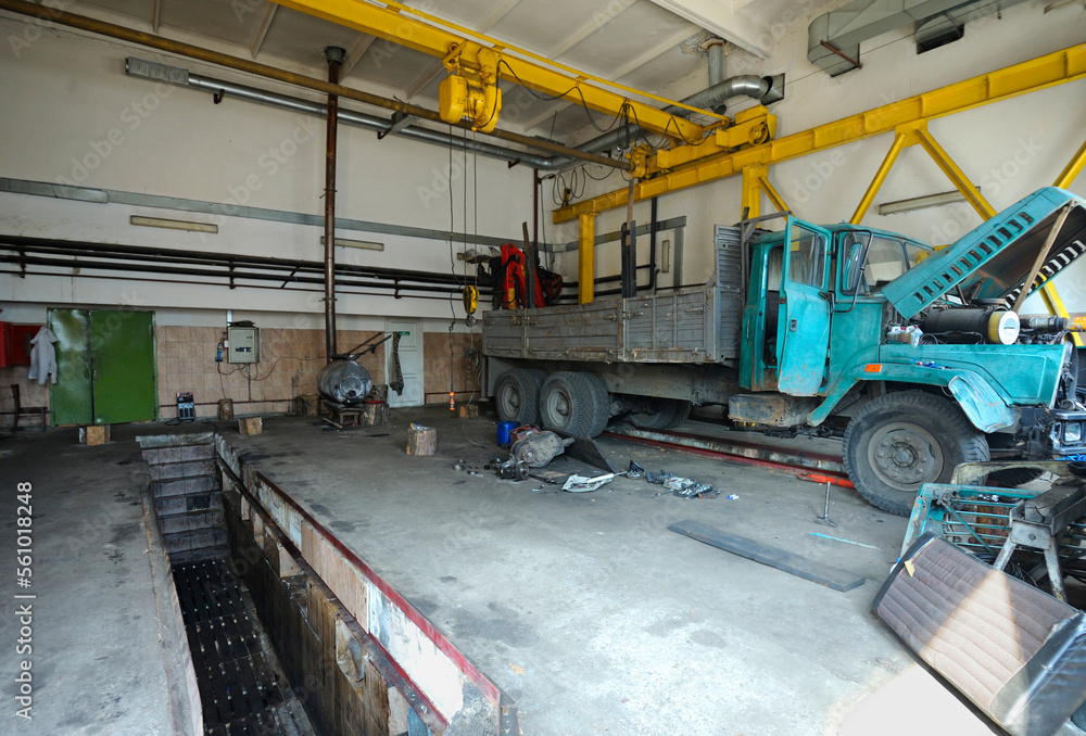 At the car mechanic workshop. Old truck being repaired, vehicle ...