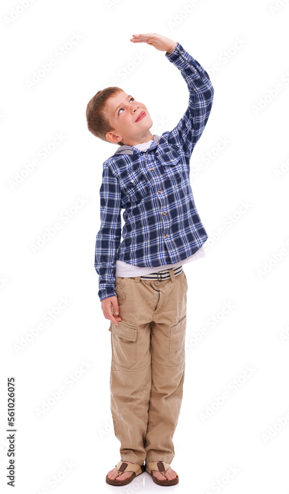 Children, growth and mockup with a boy measuring his height in studio ...