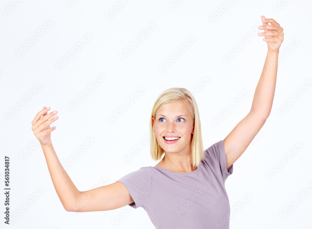 Woman, happy dance and studio by white background with smile, artistic ...