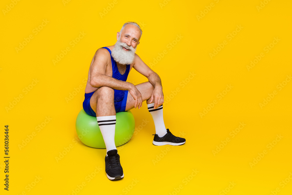 Full body photo of positive sportive person sitting fit ball enjoy ...