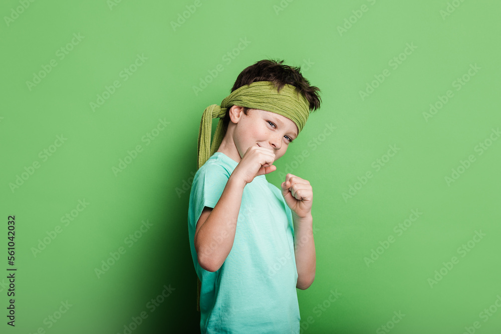 Funny boy clenching fists standing in boxing pose Stock Photo | Adobe Stock